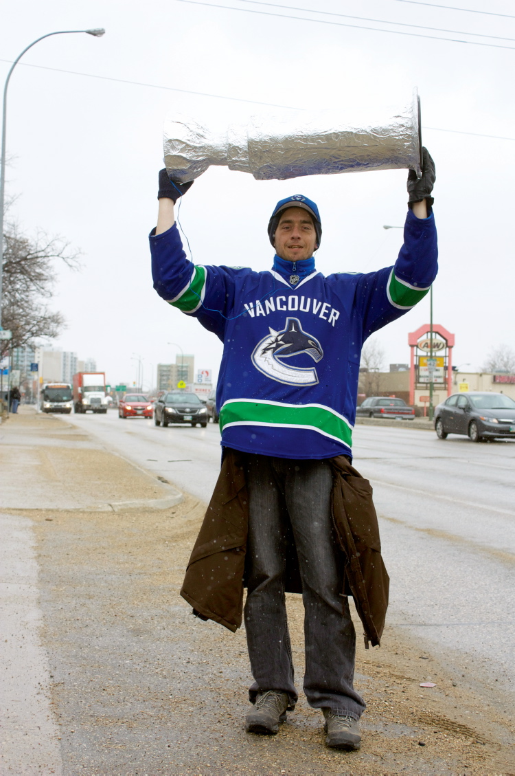 Cheering on his team – Our Communities