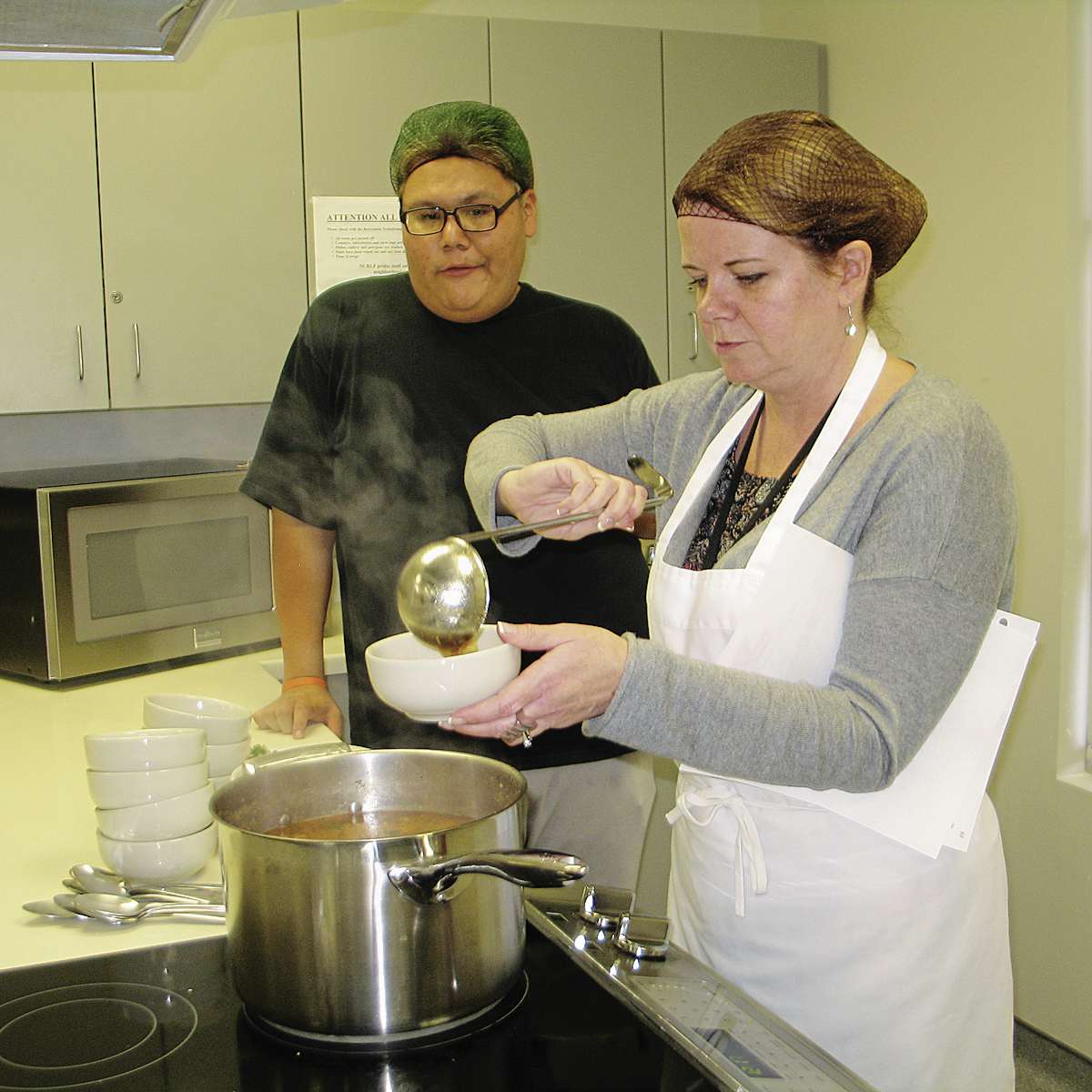 Community cookin’ in the kitchen – Our Communities