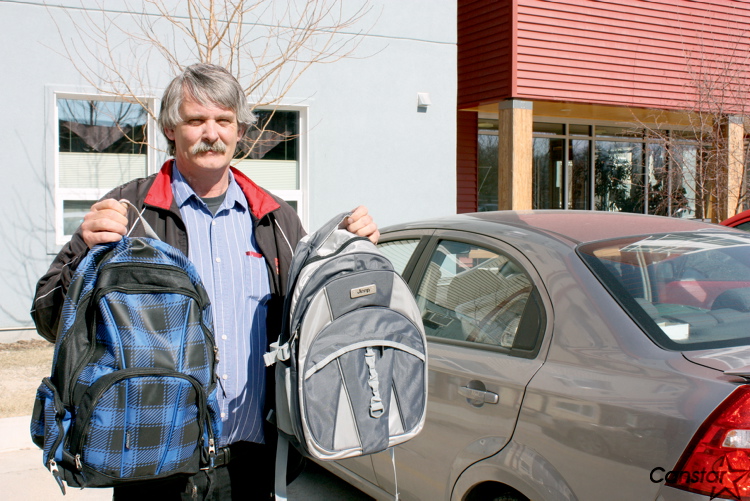 Backpack drive and flooding keeps homelessness activist busy – Our ...