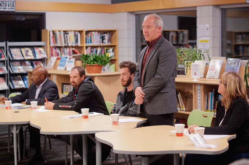 Candidates talk rooming houses at forum – Our Communities