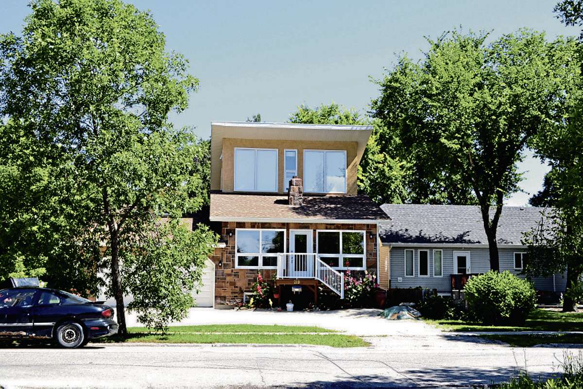 Let the sun shine in solar-heated home – Our Communities