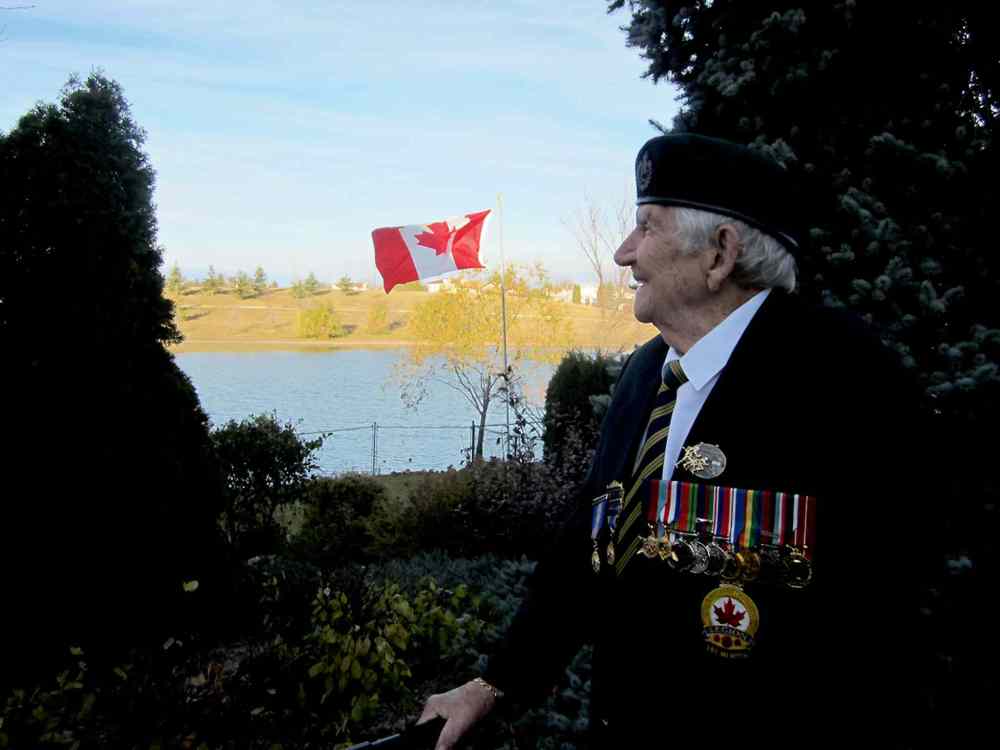 A veteran passes the torch of remembrance – Our Communities