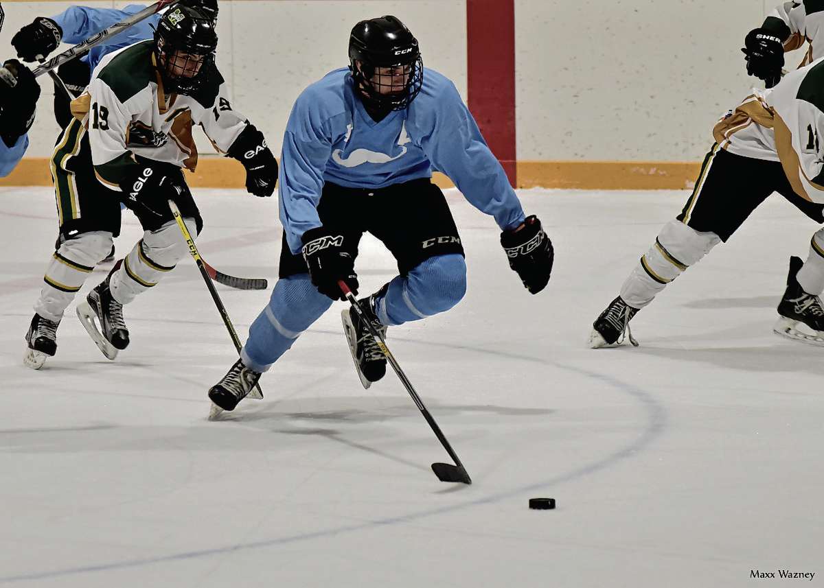 Rivals meet on ice for charity – Our Communities