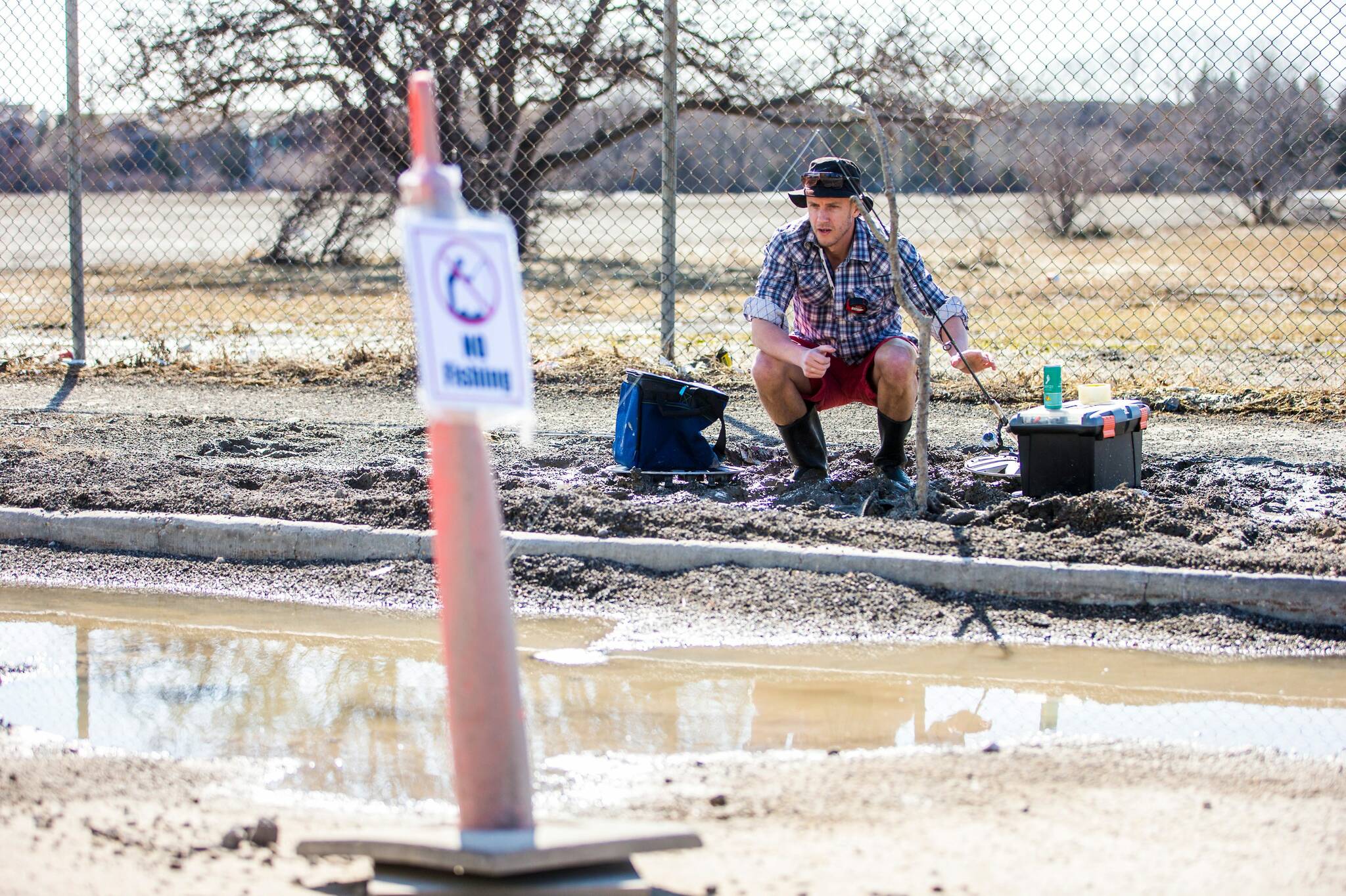 Pothole fishing photo sparks memories – Our Communities