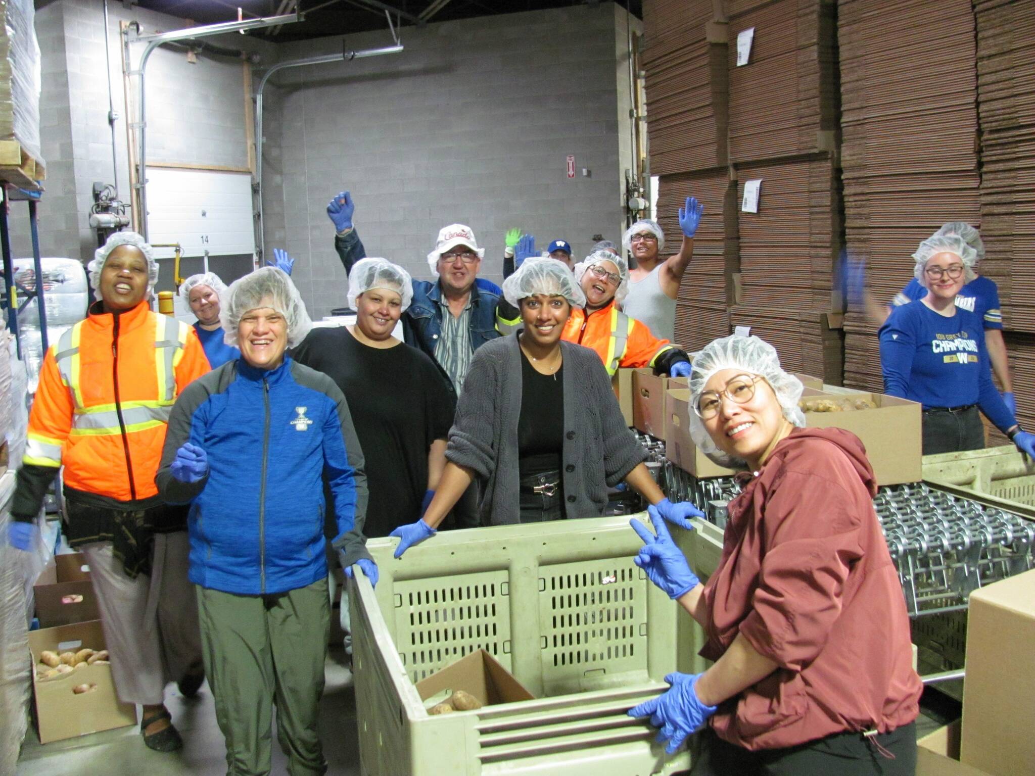 DASCH community, Peak of the Market pack spuds for locals – Our Communities