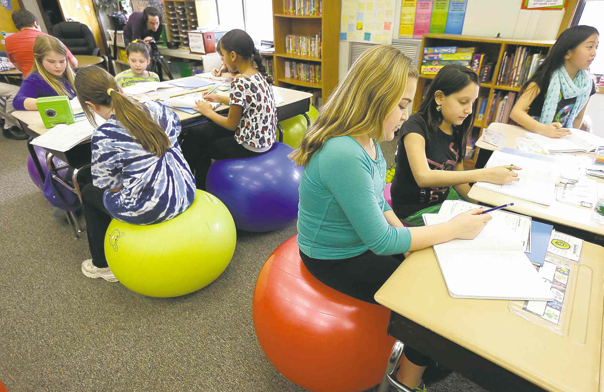 Students having a ball sitting at their desks – Winnipeg Free Press