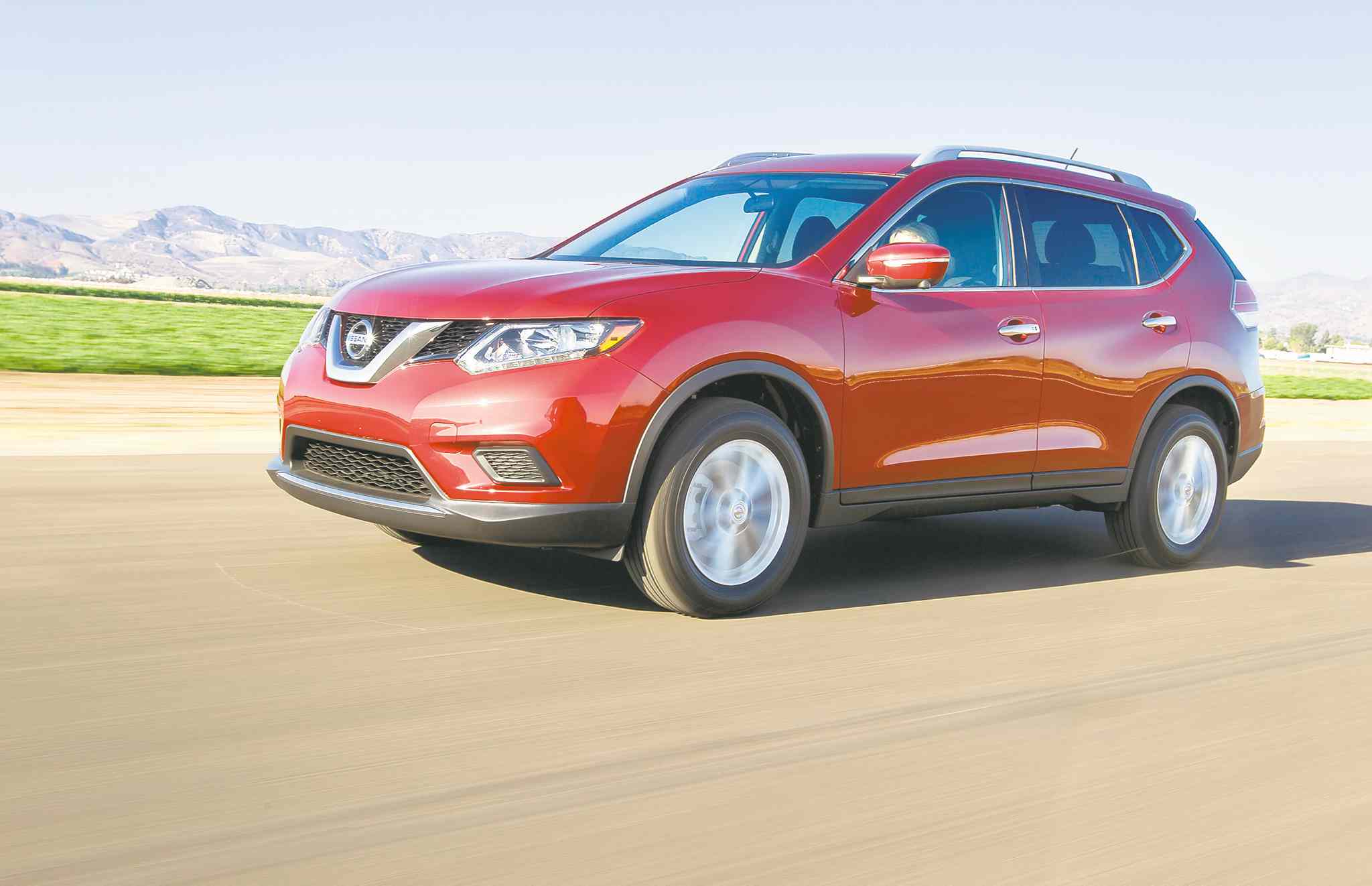 2014 NISSAN ROGUE: Revamped compact crossover drives to front of a ...