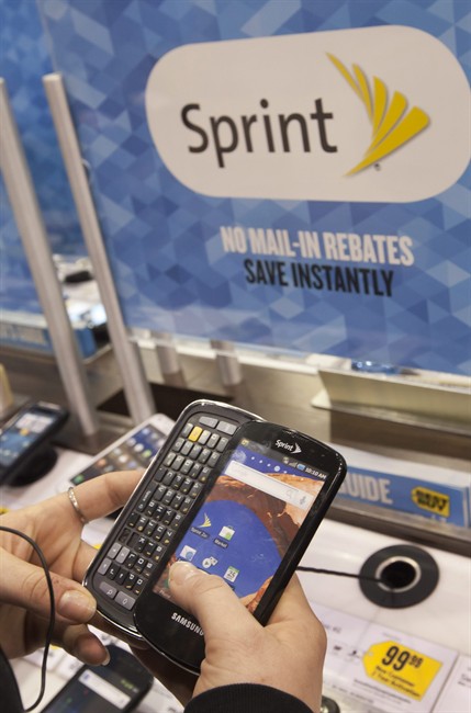 Sprint Nextel posts deeper fourth-quarter loss on cost of selling the ...