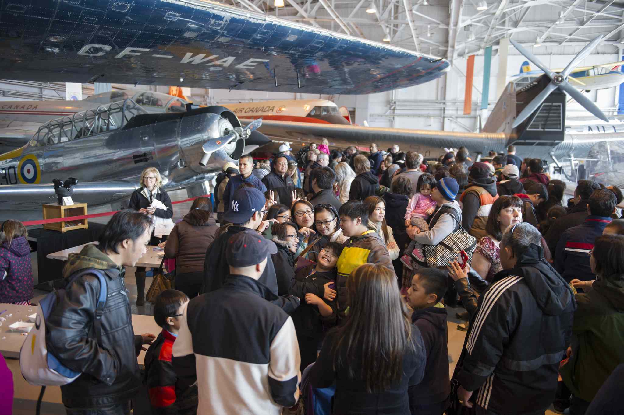 Kids enjoy an Easter egg hunt around the Royal Aviation Museum’s planes ...