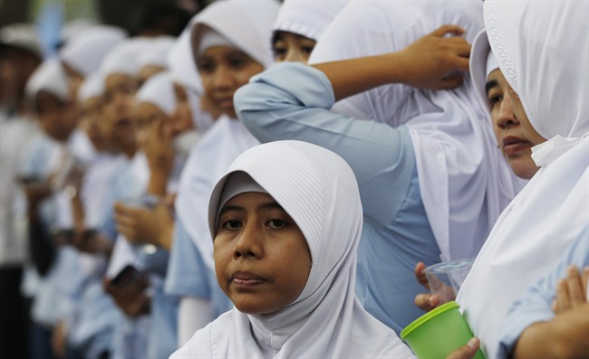 Indonesian workers strike nationwide for 2nd day as governor approves ...