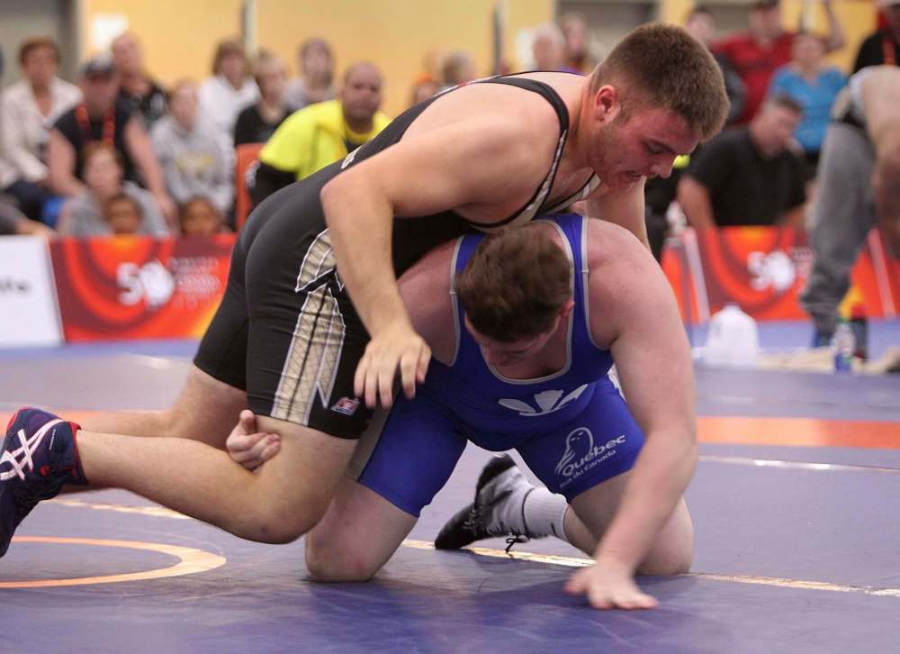 Wrestlers grapple with cuts – Winnipeg Free Press