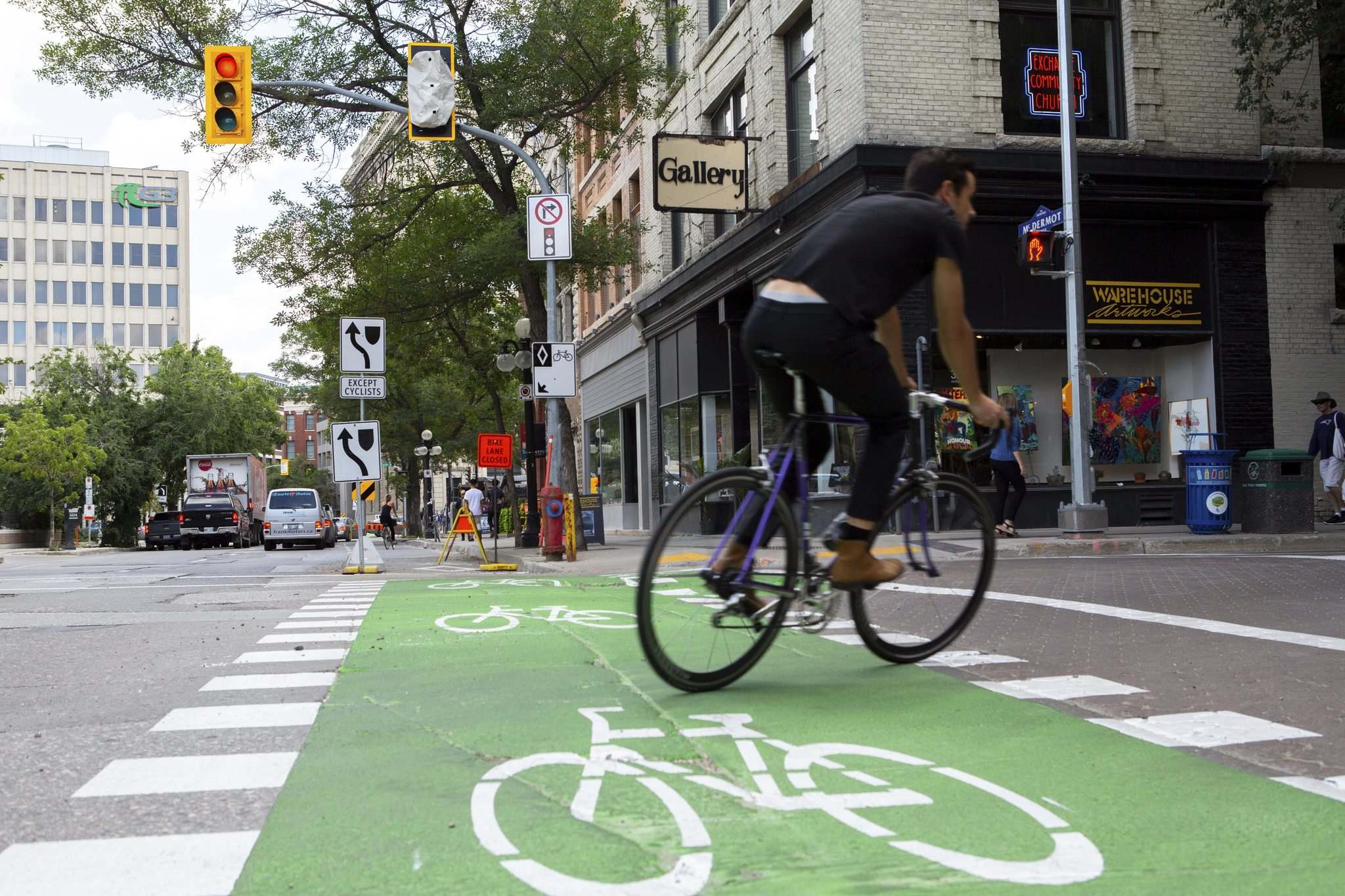 Painted bike lanes chipping, fading before opening – Winnipeg Free Press
