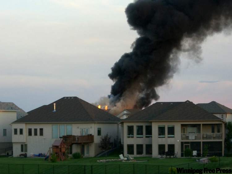 Fire guts two-storey house, family escapes – Winnipeg Free Press