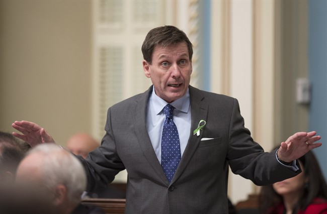 Couillard replaces cabinet minister Pierre Moreau as he battles illness ...
