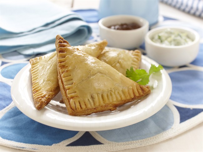 Chicken and potato hand pies filled with hot and spicy Indian flavours ...