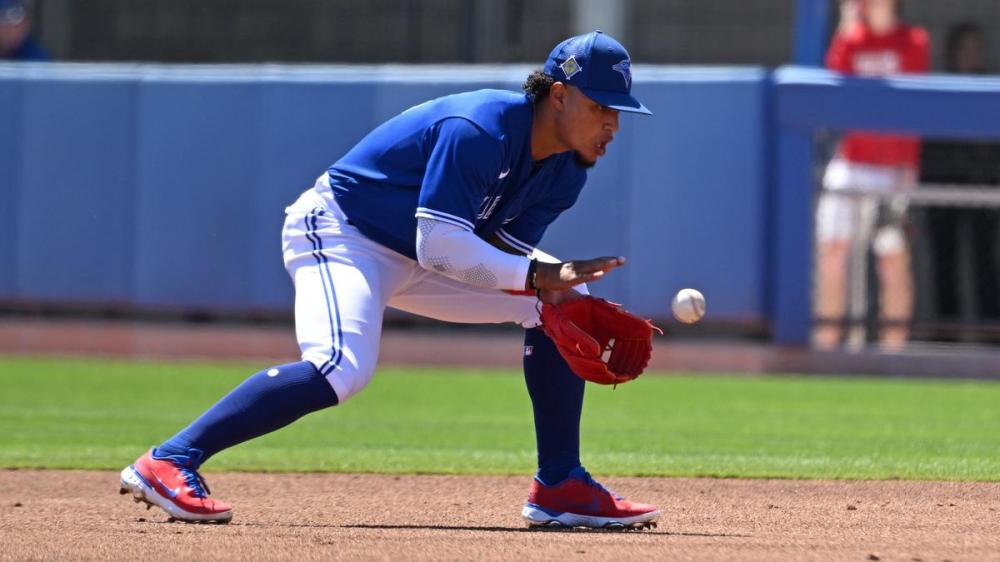 The Jays’ Santiago Espinal does it for the love of the game, and ...