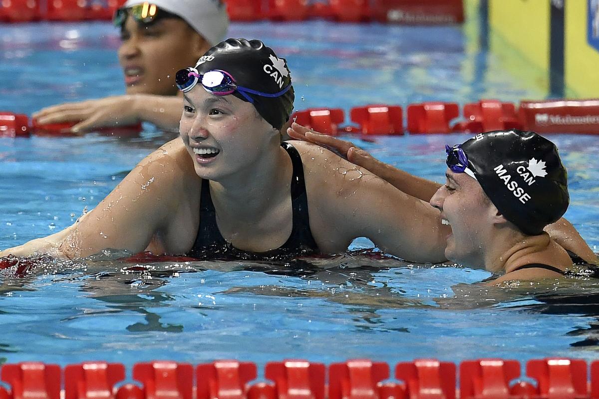 Maggie Mac Neil breaks world record as Canada wins three gold medals at ...