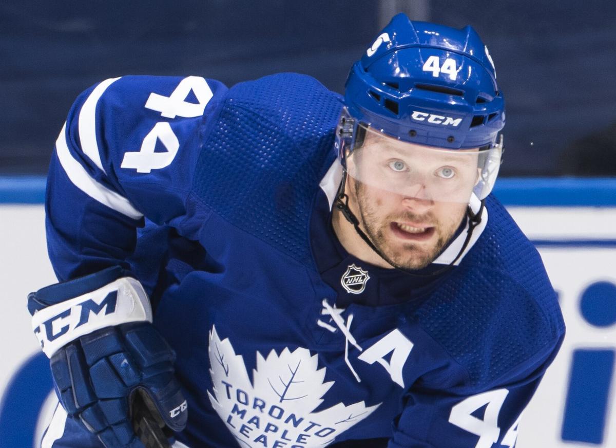 Streaking Leafs play down injury scares from Morgan Rielly and Mitch ...