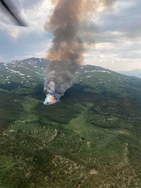 Lightning storms spark dozens of wildfires in Yukon, heat warning ...