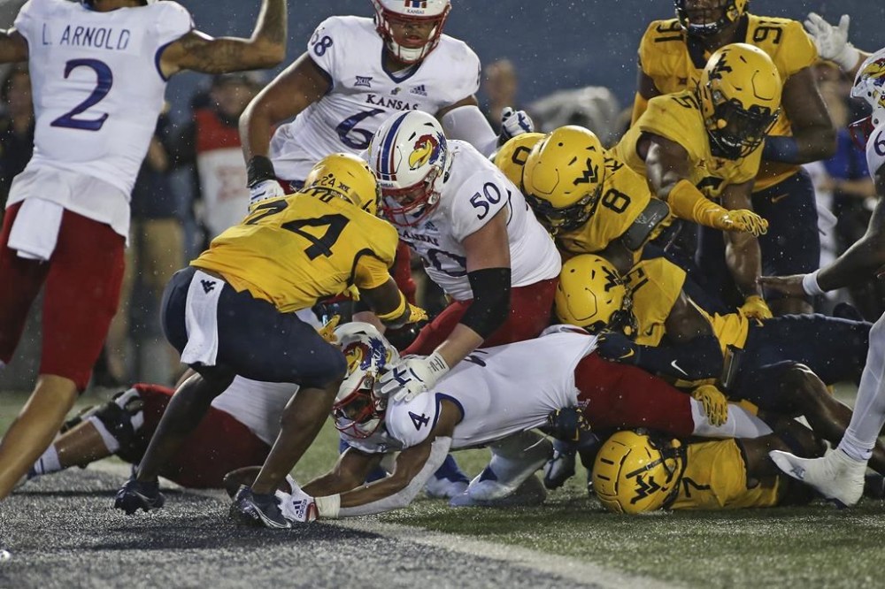 Jalon Daniels, Bryant lead Kansas over WVU 55-42 in OT – Winnipeg Free ...