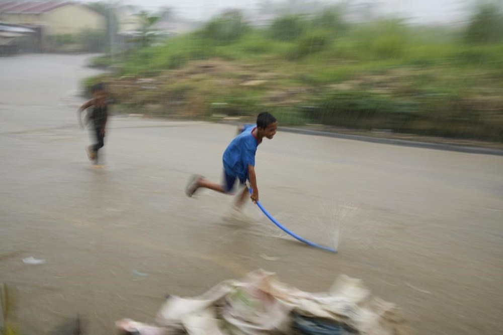 Climate Migration: Filipino families to flee amid typhoons – Winnipeg ...