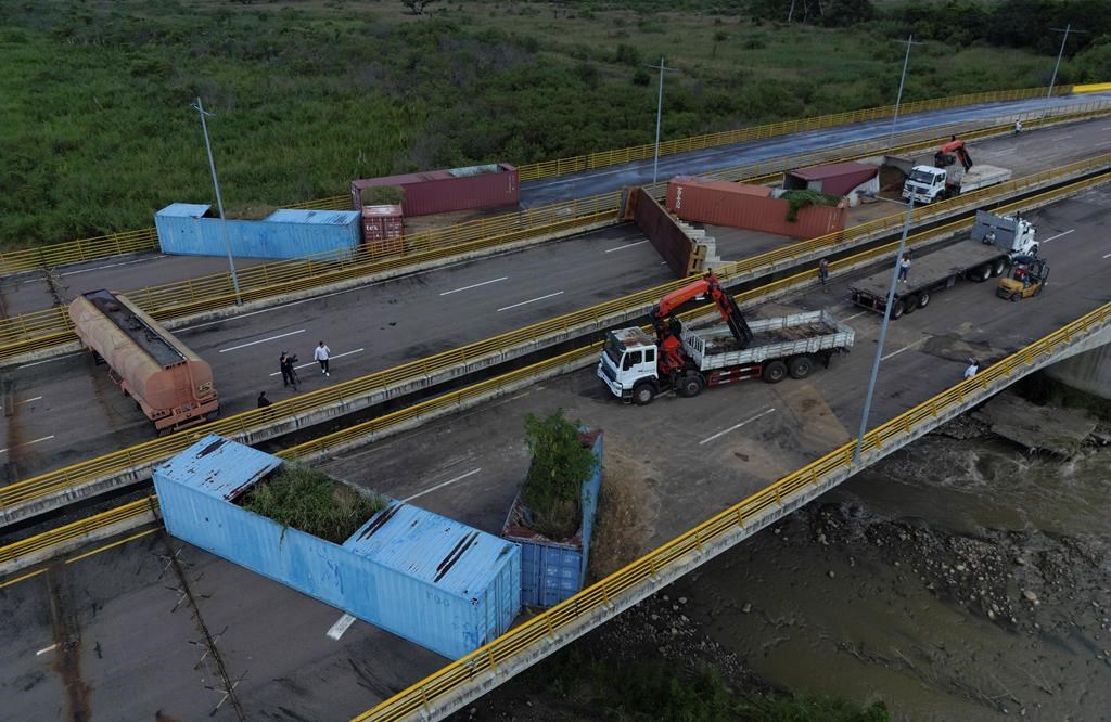 Colombia, Venezuela open key binational bridge as ties warm – Winnipeg ...