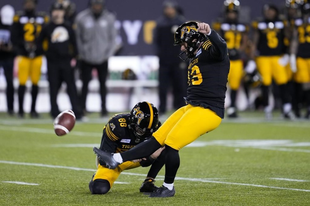 Edmonton Elks sign veteran players Michael Domagala and Tobi Antigha ...