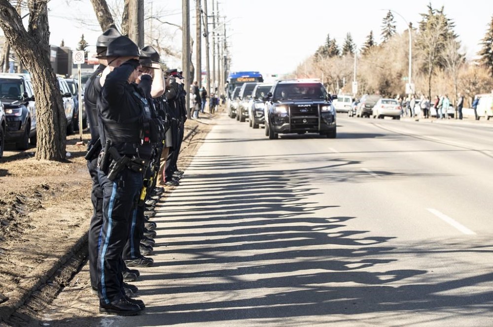 Procession for Edmonton police officers shot and killed responding to ...