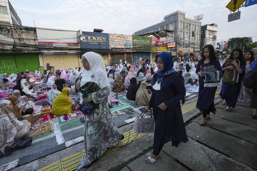 Indonesia’s Muslims celebrate Eid al-Adha with feasts after disease ...