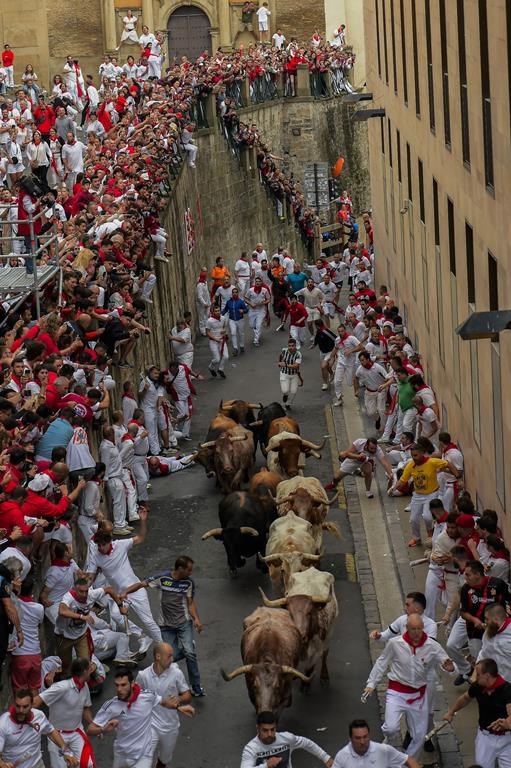 Thousands take part in first running of the bulls in Spain’s San Fermin ...
