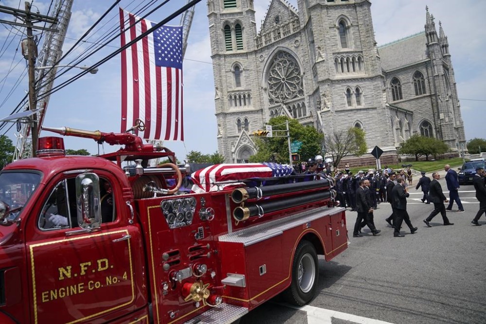 Firefighter killed while battling cargo ship fire is posthumously ...