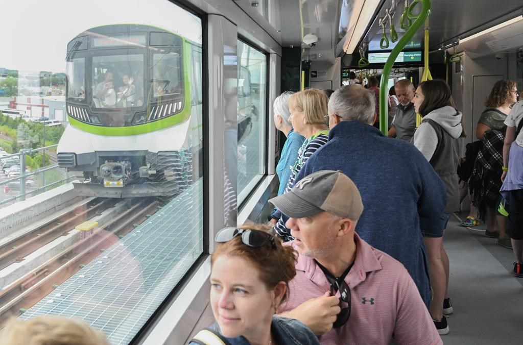 Excitement, optimism as hundreds line up to ride Montreal’s new light ...