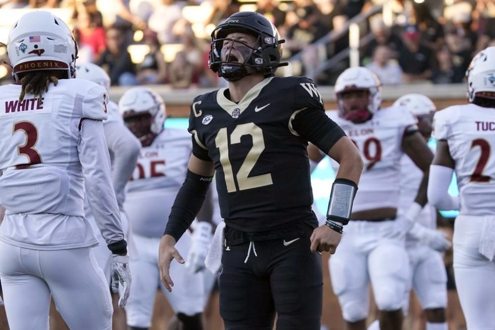 Griffis throws for 3 touchdowns to lead Wake Forest past Elon 37-17 in ...