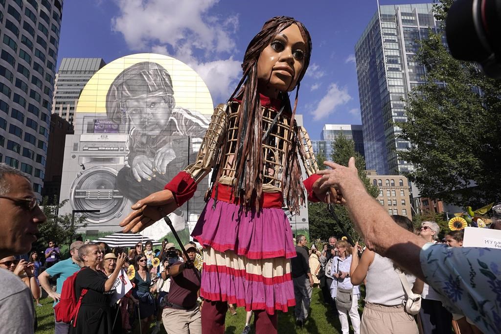 Little Amal, a 12-foot puppet of a Syrian refugee, began its journey ...