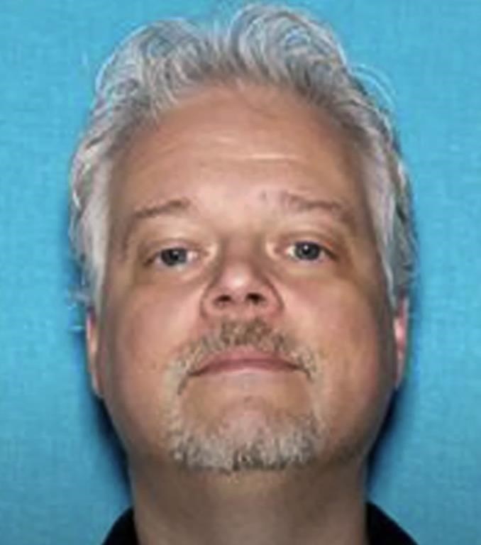 Investigation shows armed officer was hostage at home of Grammy winner ...