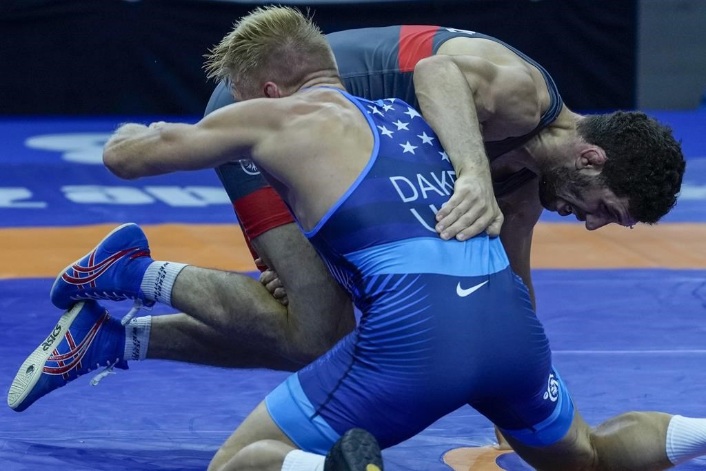 Wrestling body explains why it let Russian champions compete at world ...