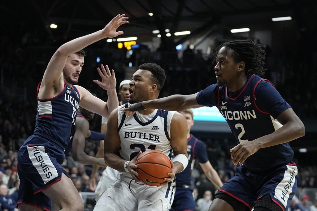 No. 4 UConn comes back in 2nd half to beat Butler 88-81 behind Karaban ...