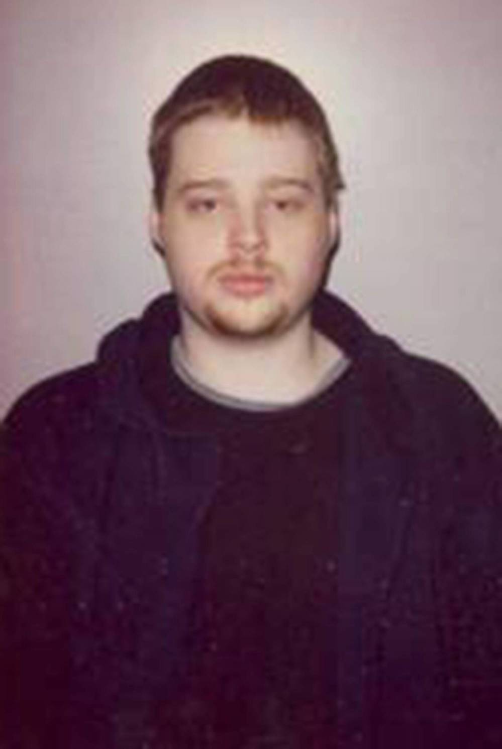 Free less than year after killing stepmother in 2000, man back in jail ...