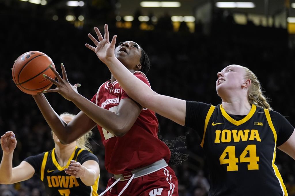 Clark moves up career scoring list as No. 2 Iowa defeats Wisconsin, 96 ...