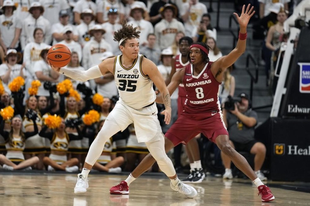 Mitchell turns 24 while turning a double-double in Arkansas win over ...