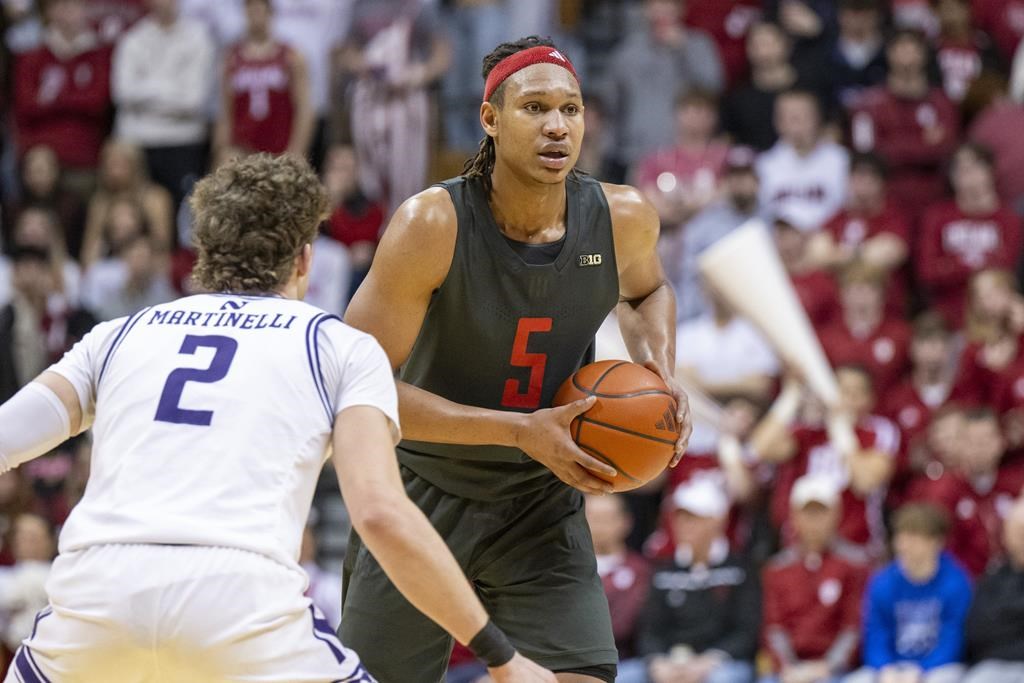 Langborg scores 26 points, Northwestern turns back late Indiana rally ...