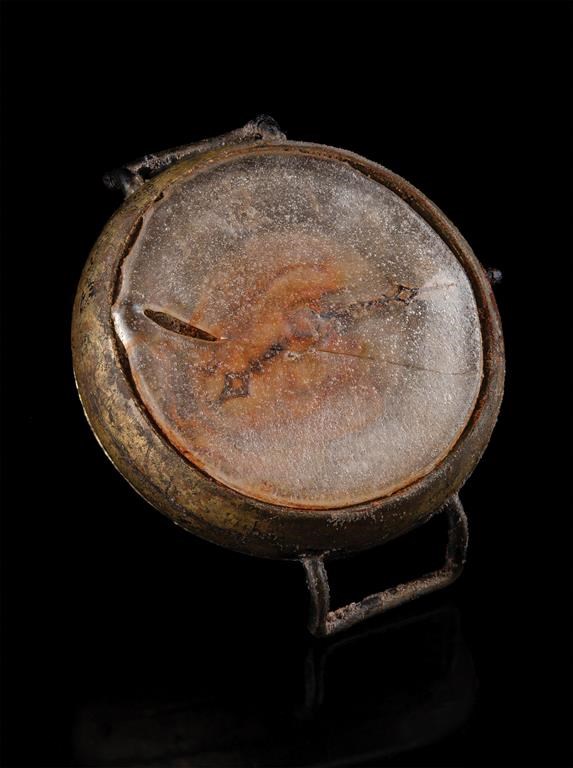 A watch that melted during the atomic blast over Hiroshima, Japan ...
