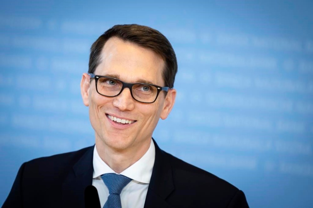 Swiss central bank makes a surprise cut to its key interest rate as ...