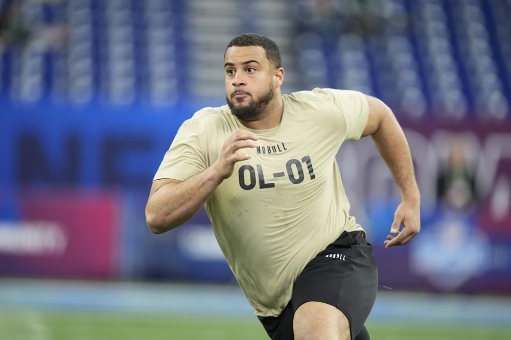 Illinois offensive lineman Adams retains top spot in CFL Scouting ...