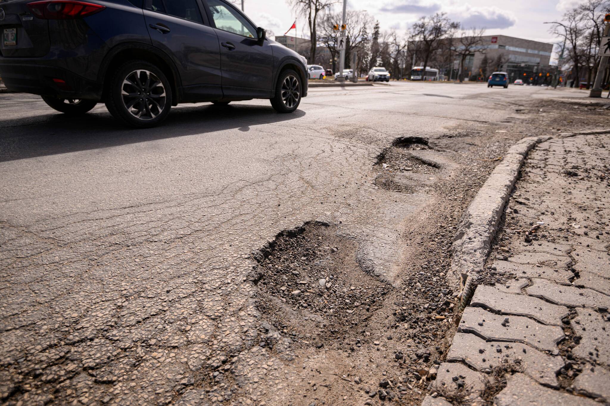 Province on pace to break record for pothole insurance claims ...