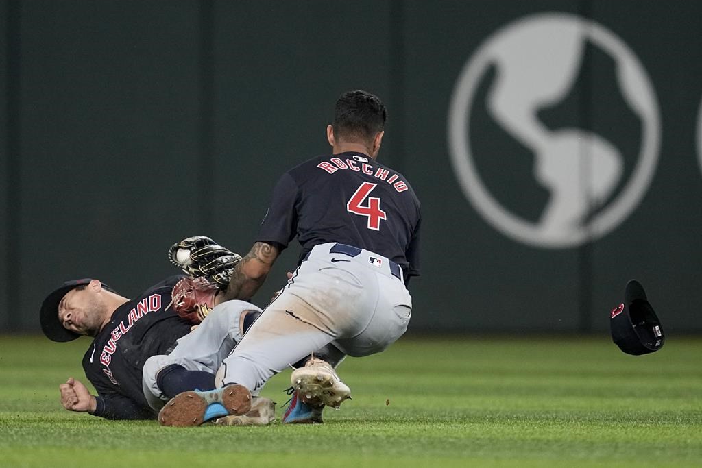 Guardians CF Freeman toughs it out after crushing collision with ...