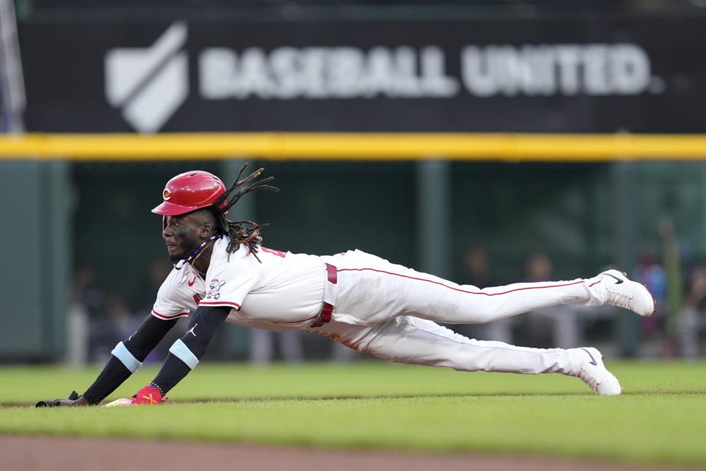Hinds homers in big league debut and Abbott goes 7 innings as Reds ...