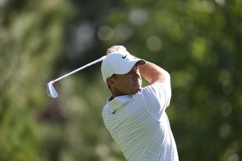 Rory McIlroy’s tee shot goes in the rough. His 3-wood goes in the water ...