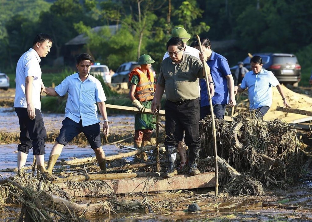 Vietnam typhoon death toll rises to 233 as more bodies found in areas ...