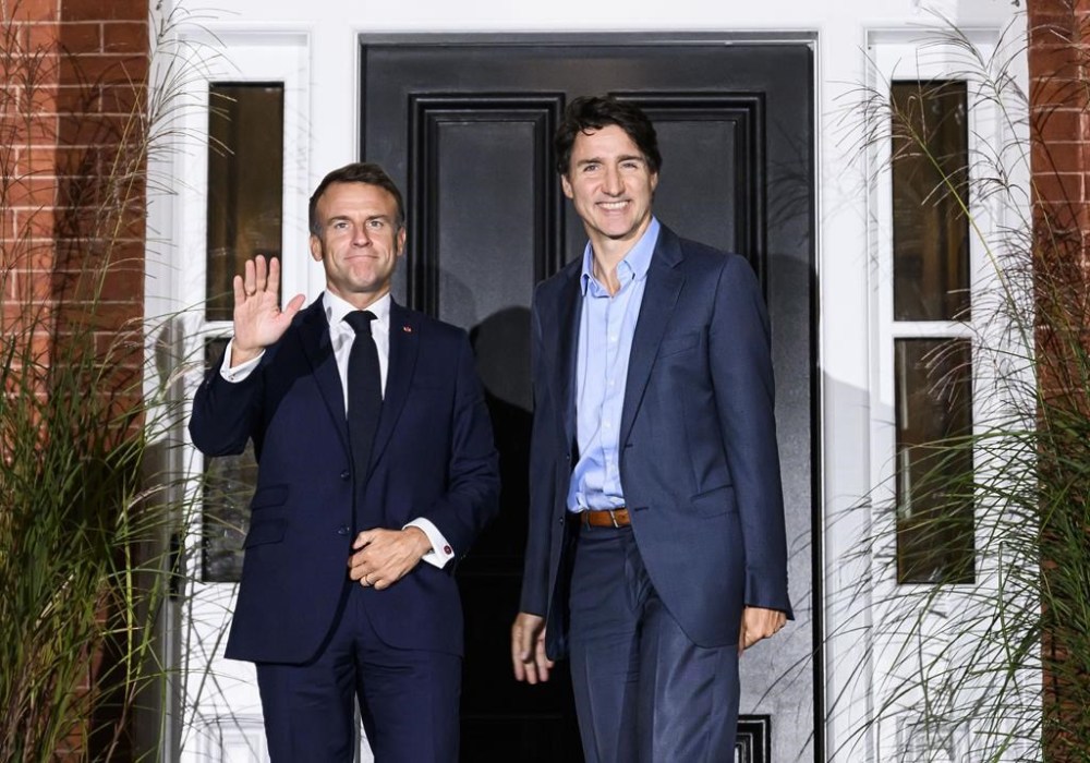 Macron, Trudeau meet as French president visits Canada – Winnipeg Free ...